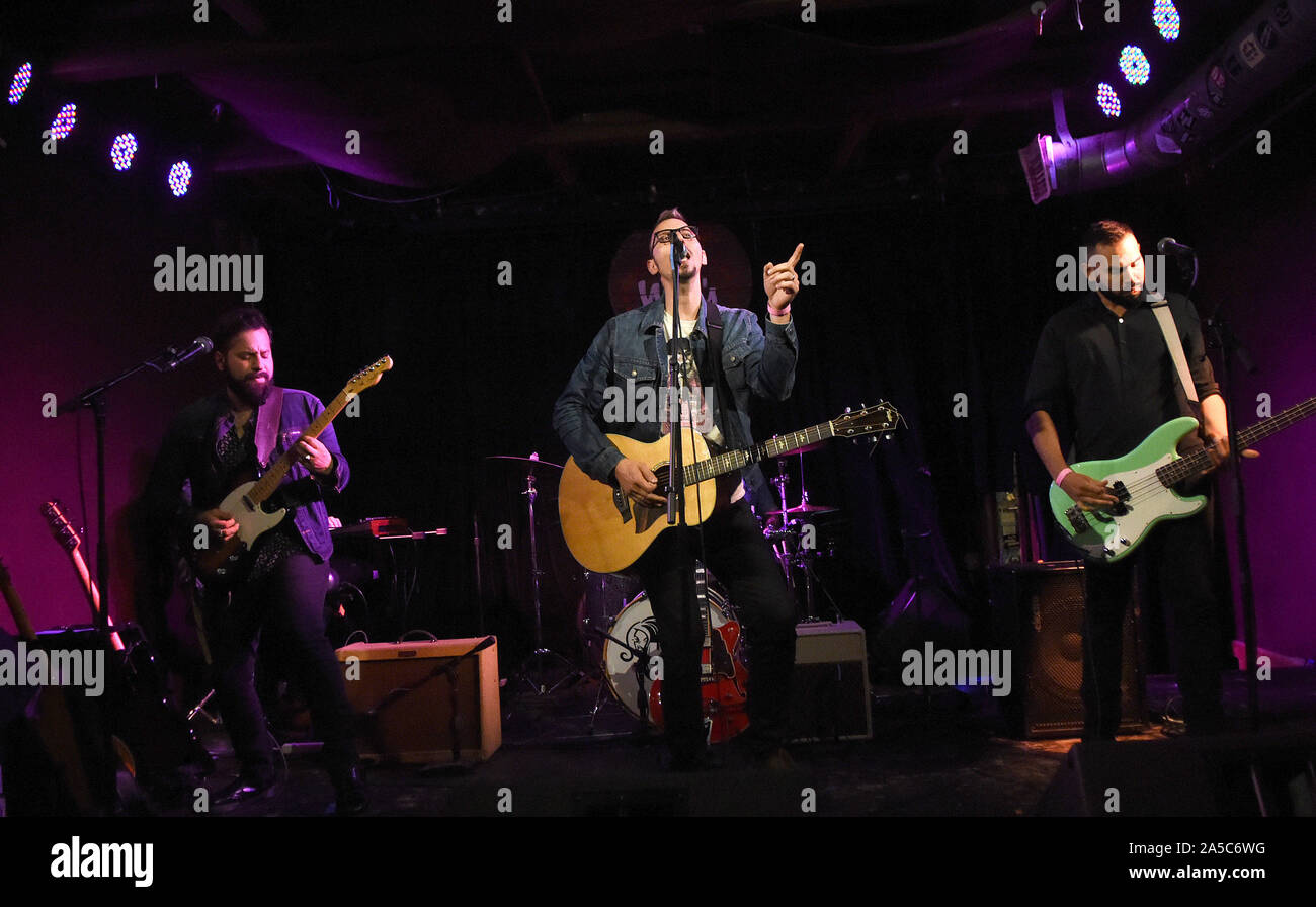 Jonathan Bonilla, Mike Montali and Chris Urriola perform with the ...