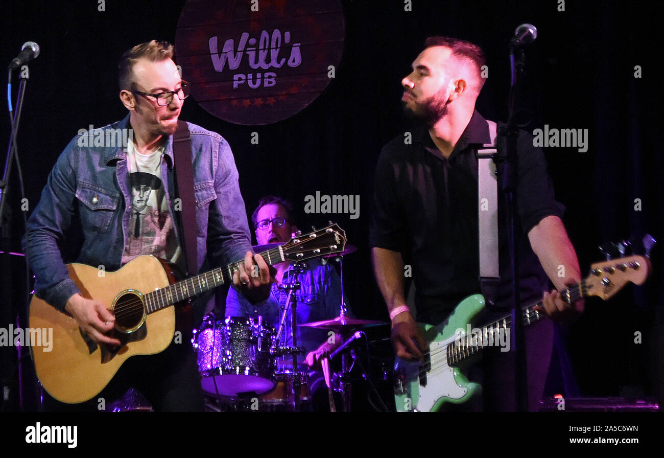 Mike Montali, Andrew Zehnal and Chris Urriola perform with the Hollis ...