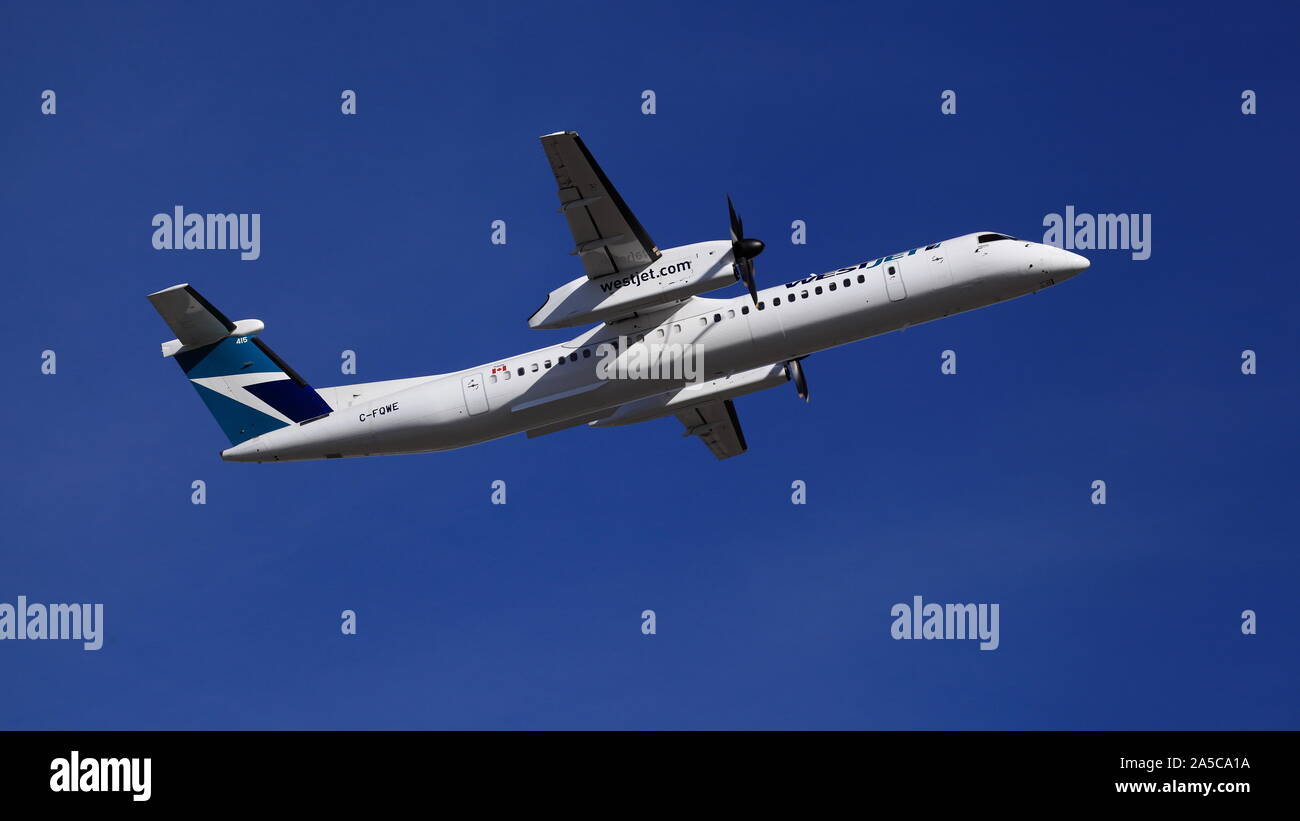 WestJet Airlines De Havilland DHC-8 C-FQWE in flight, April 29, 2016 ...