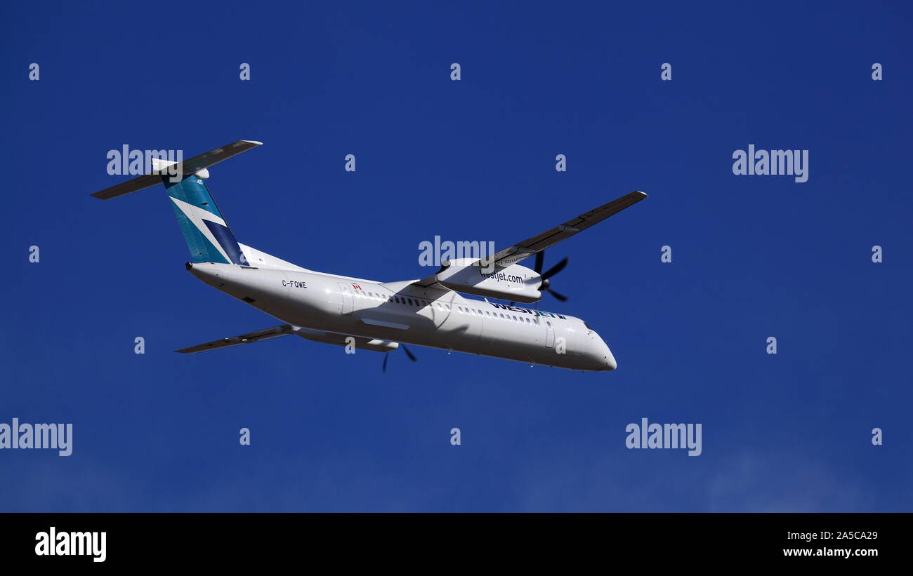 WestJet Airlines De Havilland DHC-8 C-FQWE in flight, April 29, 2016 ...