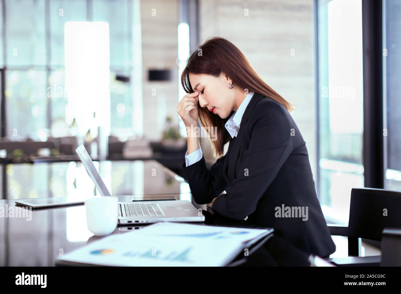 tired and stressed business woman working in office Stock Photo - Alamy