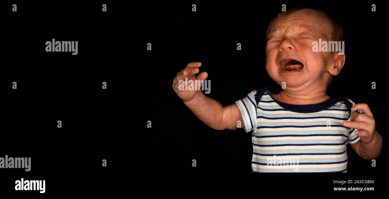 A 3 Week Old Baby Poses on a Black Background. Perfect for Memes with ...