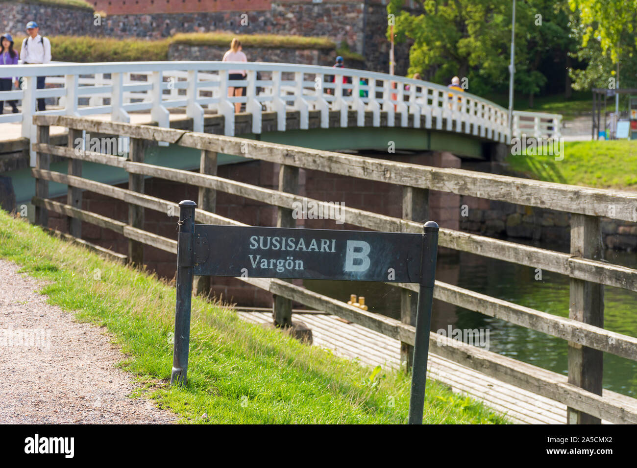 White wooden bridge from Iso Mustasaari island to Susisaari island in ...
