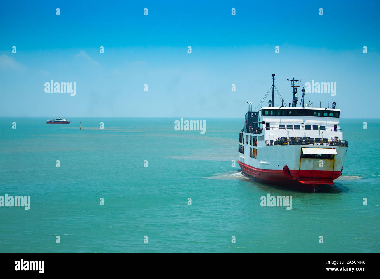 Ferry boat crossing in Sea Stock Photo - Alamy