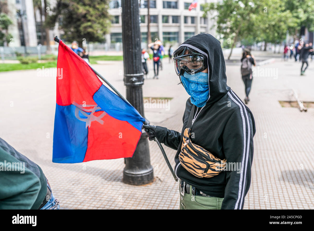 People portraits at Santiago de Chile streets during riots in the city ...
