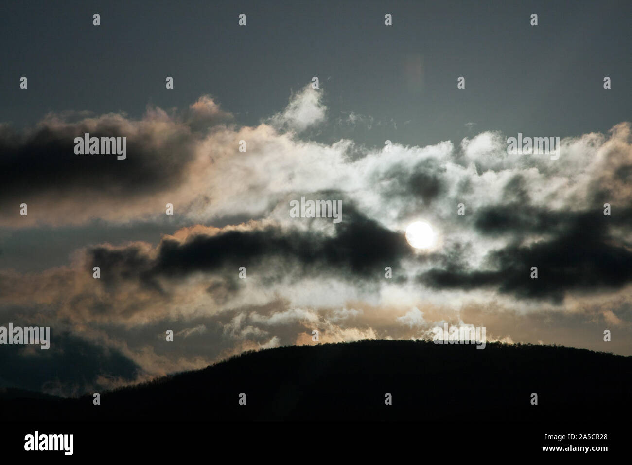 Clouds covering the sun hi-res stock photography and images - Alamy