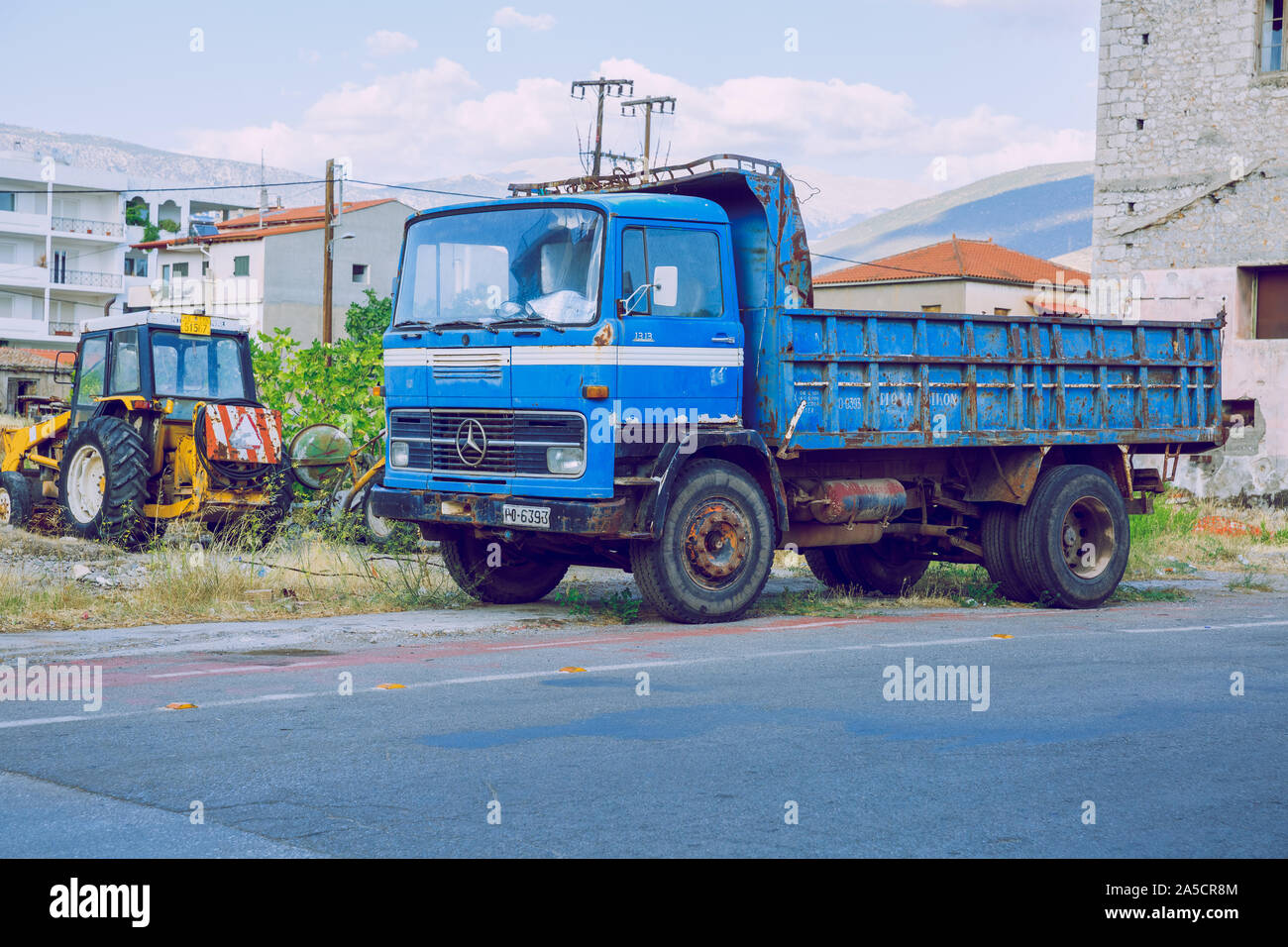City Athens, Greek Republic. Way and blue truck, street and tractor. 13 ...