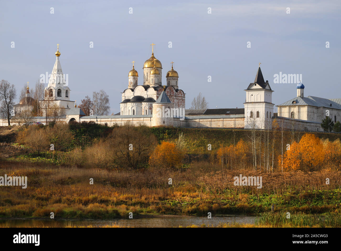 Beautiful autumn photo of an Orthodox monastery on the river Bank in ...