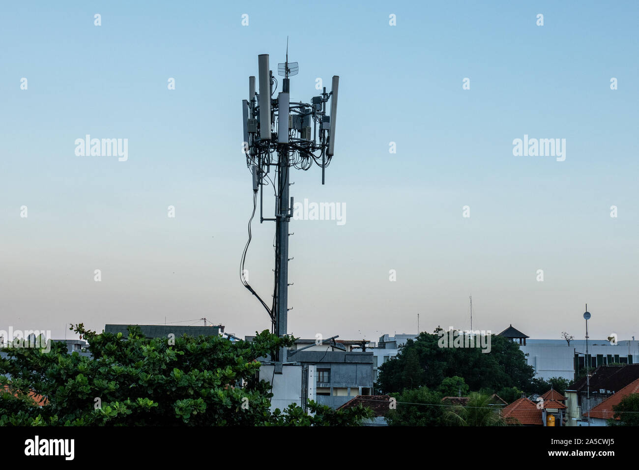 Ugly wires and concrete Telecommunications tower towering above the ...
