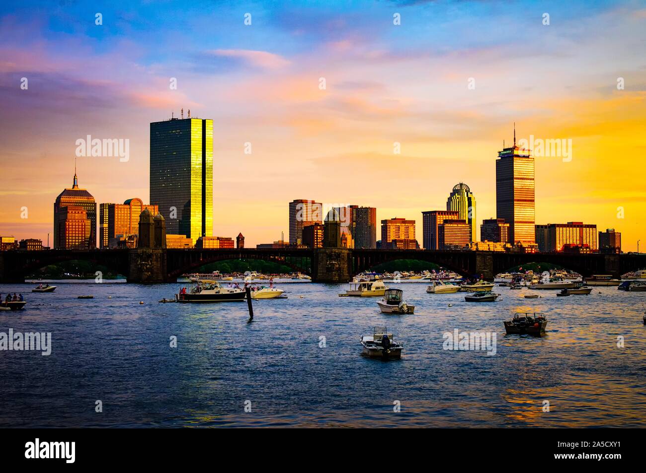 Urban scnery with a river in the middle of the city and ships sailing ...