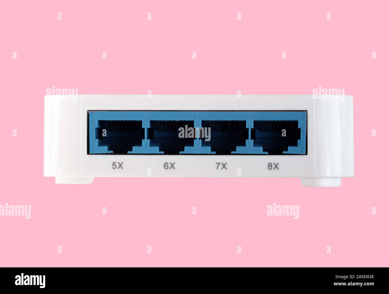 White 8 Port Plastic Ethernet Switch isolated on pink background at dry ...