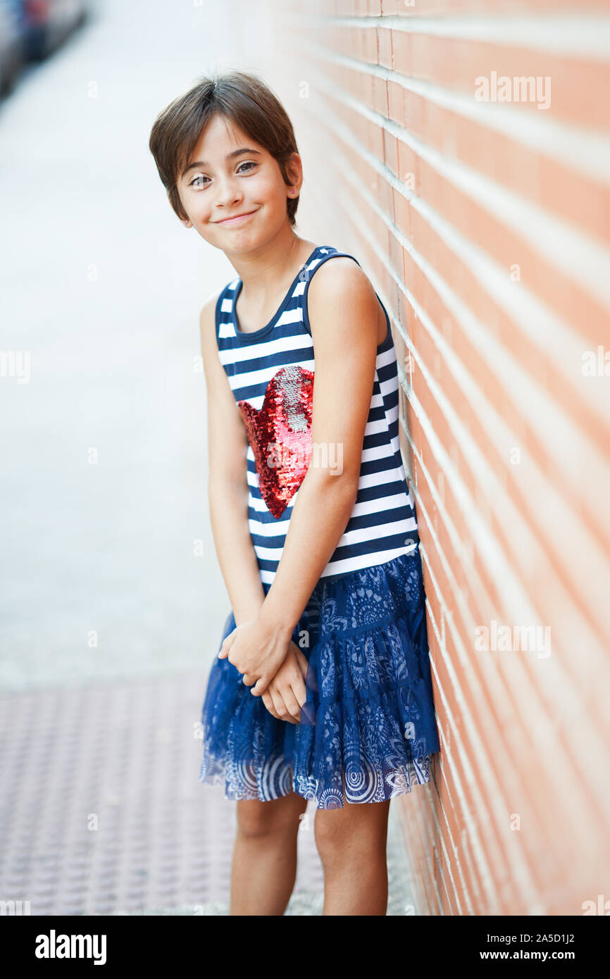 Little girl, eight years old, having fun outdoors Stock Photo - Alamy