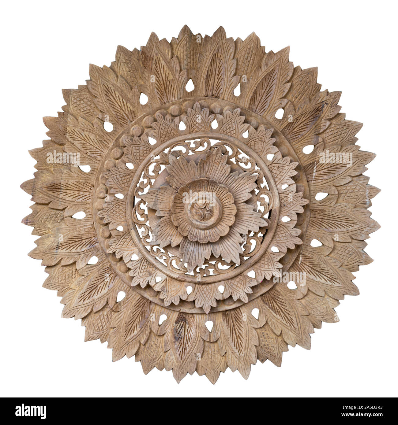 Wooden pattern of flower on carve teak wood in circle shape for ...