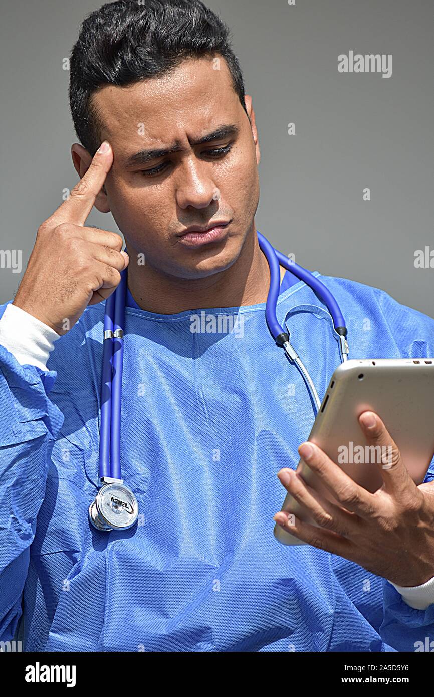 Male Doctor Thinking Stock Photo - Alamy