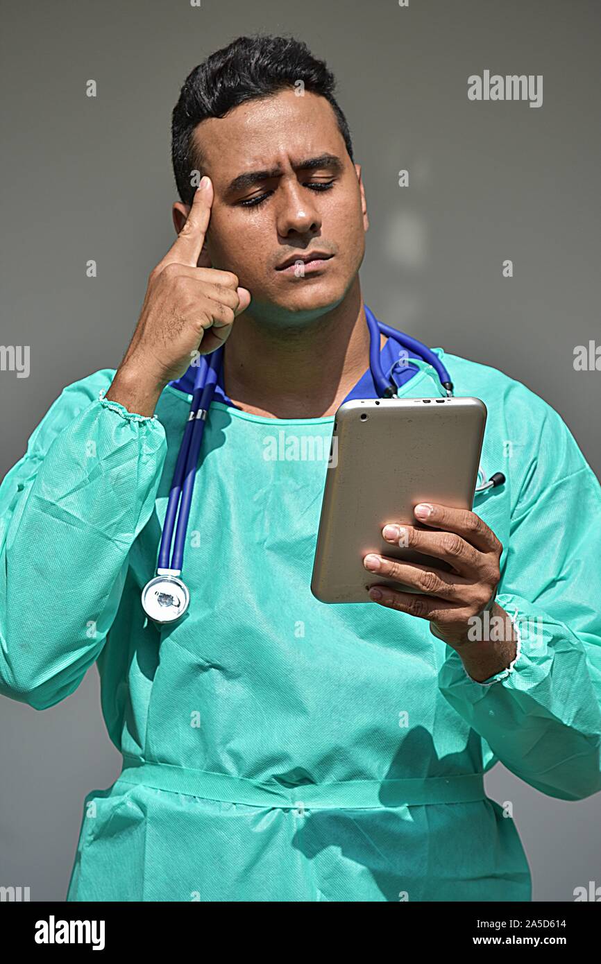 Thoughtful Male Surgeon Stock Photo - Alamy