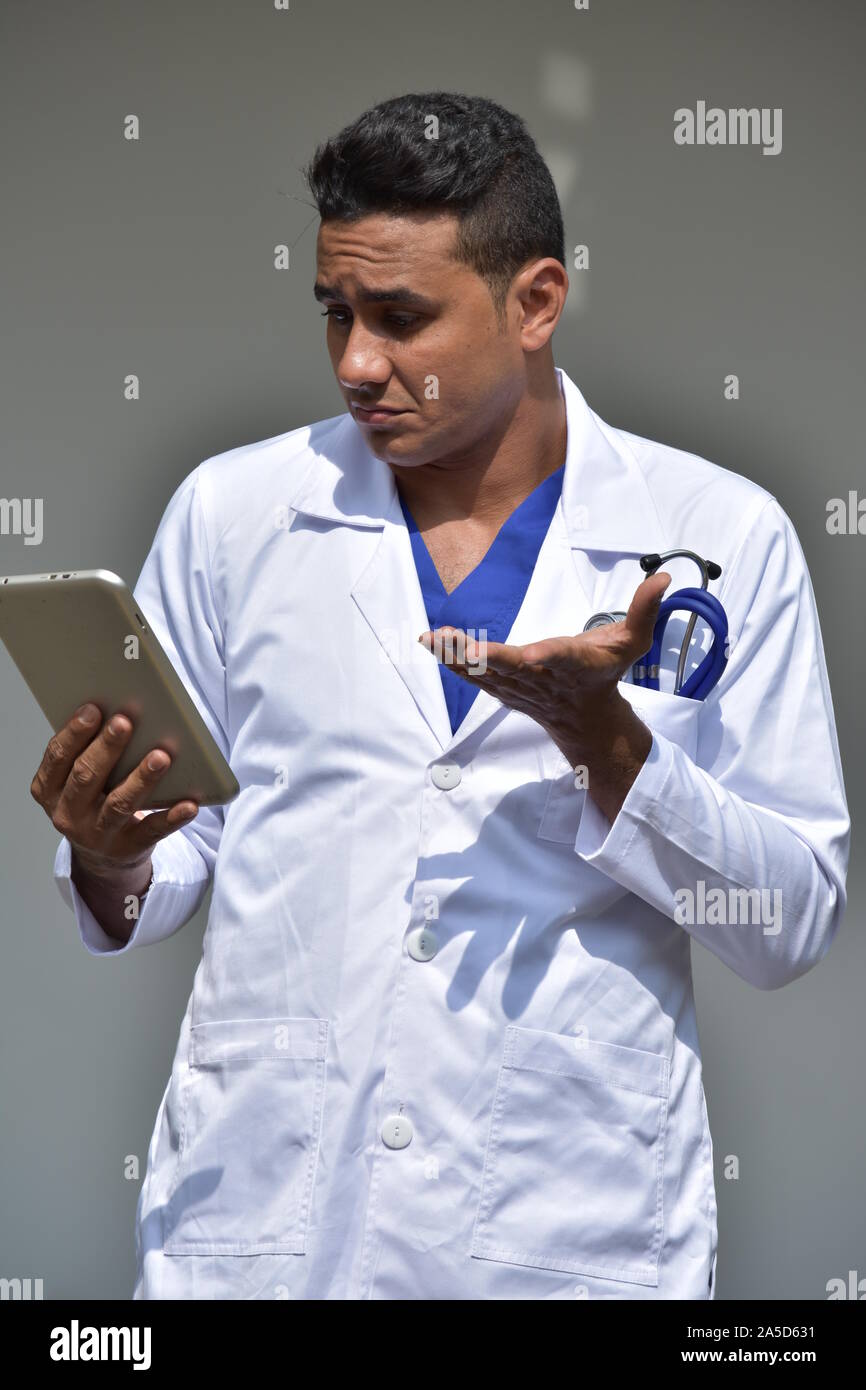 Confused Male Doctor Stock Photo - Alamy