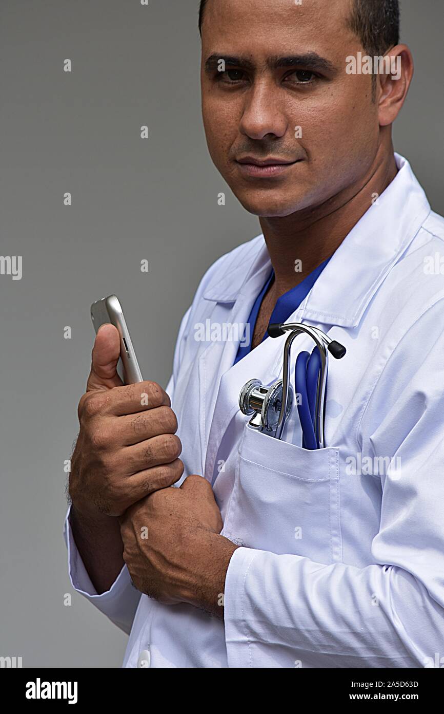 Serious medical practitioner wearing hi-res stock photography and ...