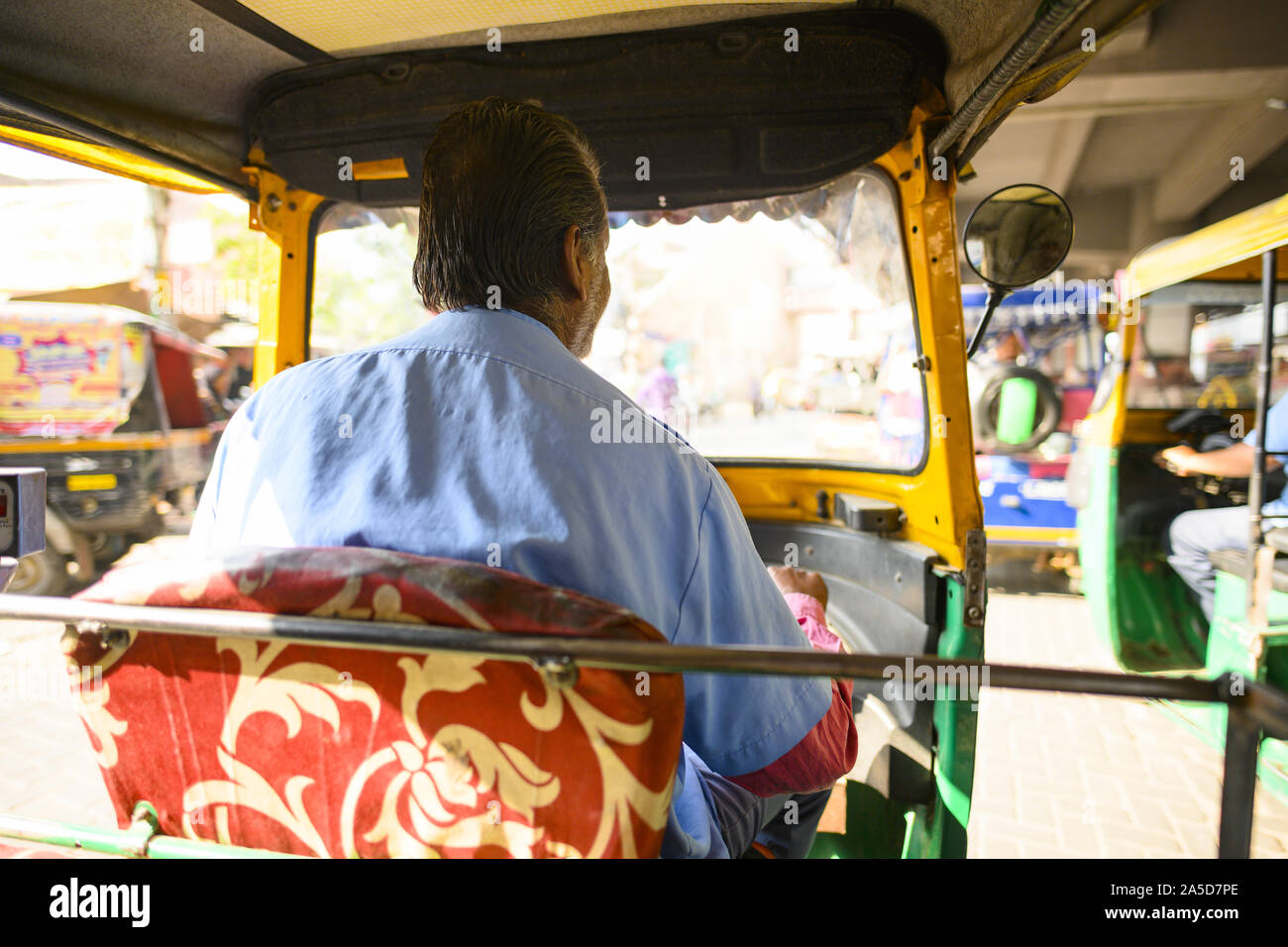 (Passenger point of view) A unidentified driver is riding his auto ...