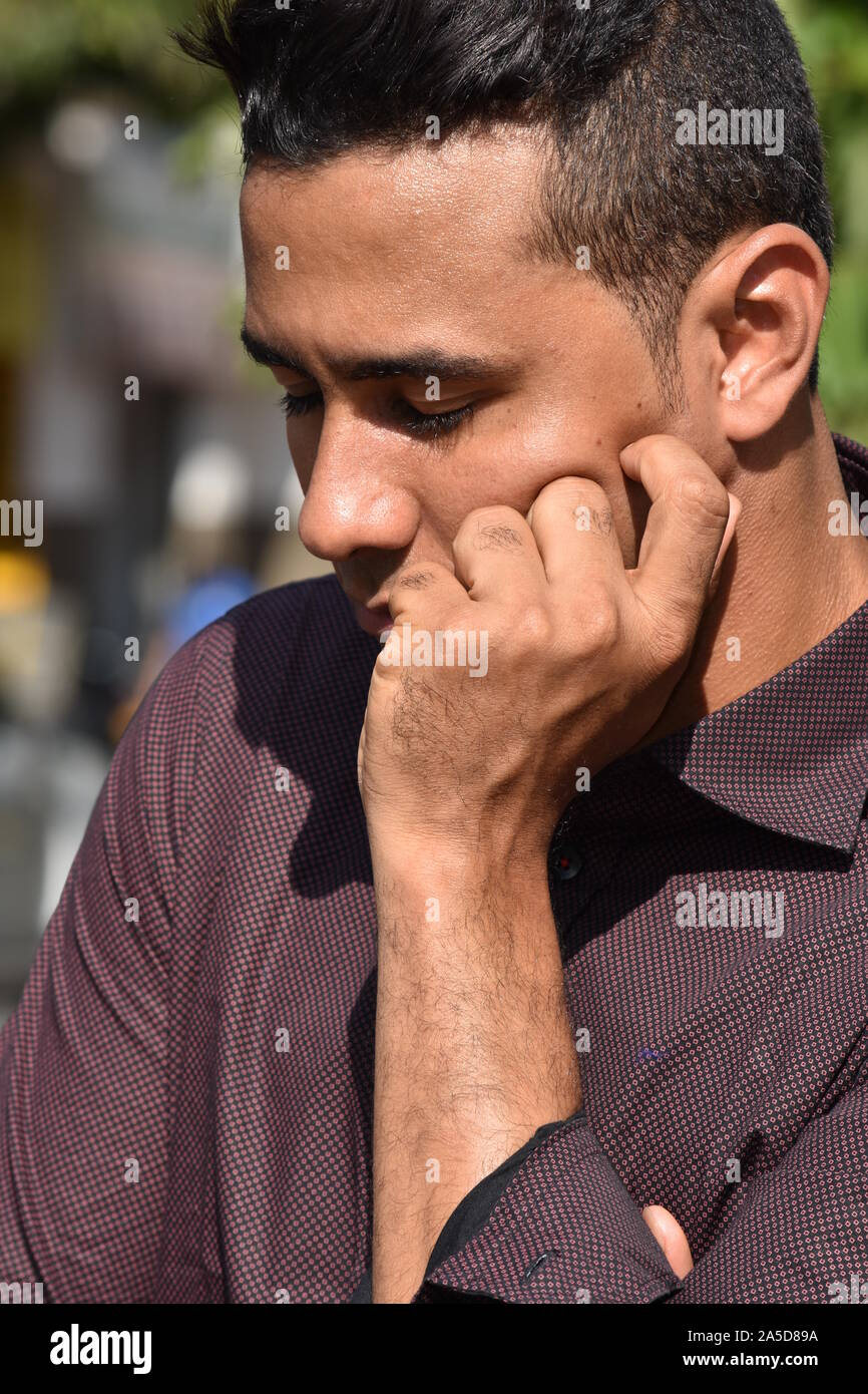 Sad hispanic hi-res stock photography and images - Alamy