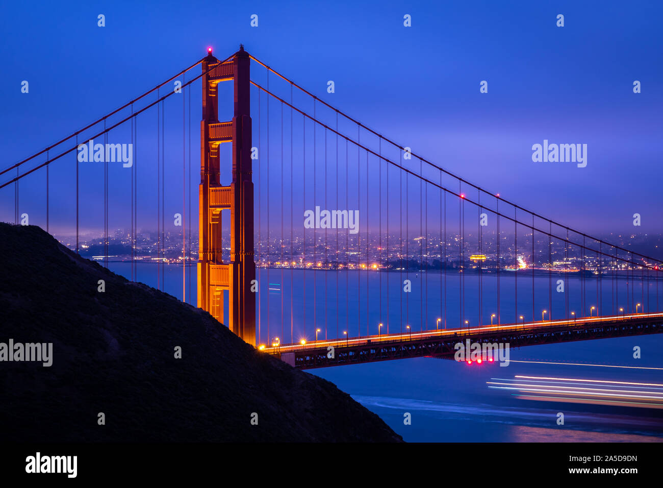 View from Batter Spencer to Golden Gate bridge with warm light ...