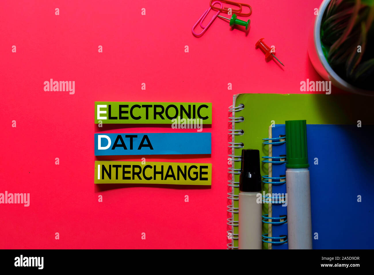 EDI. Electronic Data Interchange acronym on sticky notes. Office desk ...