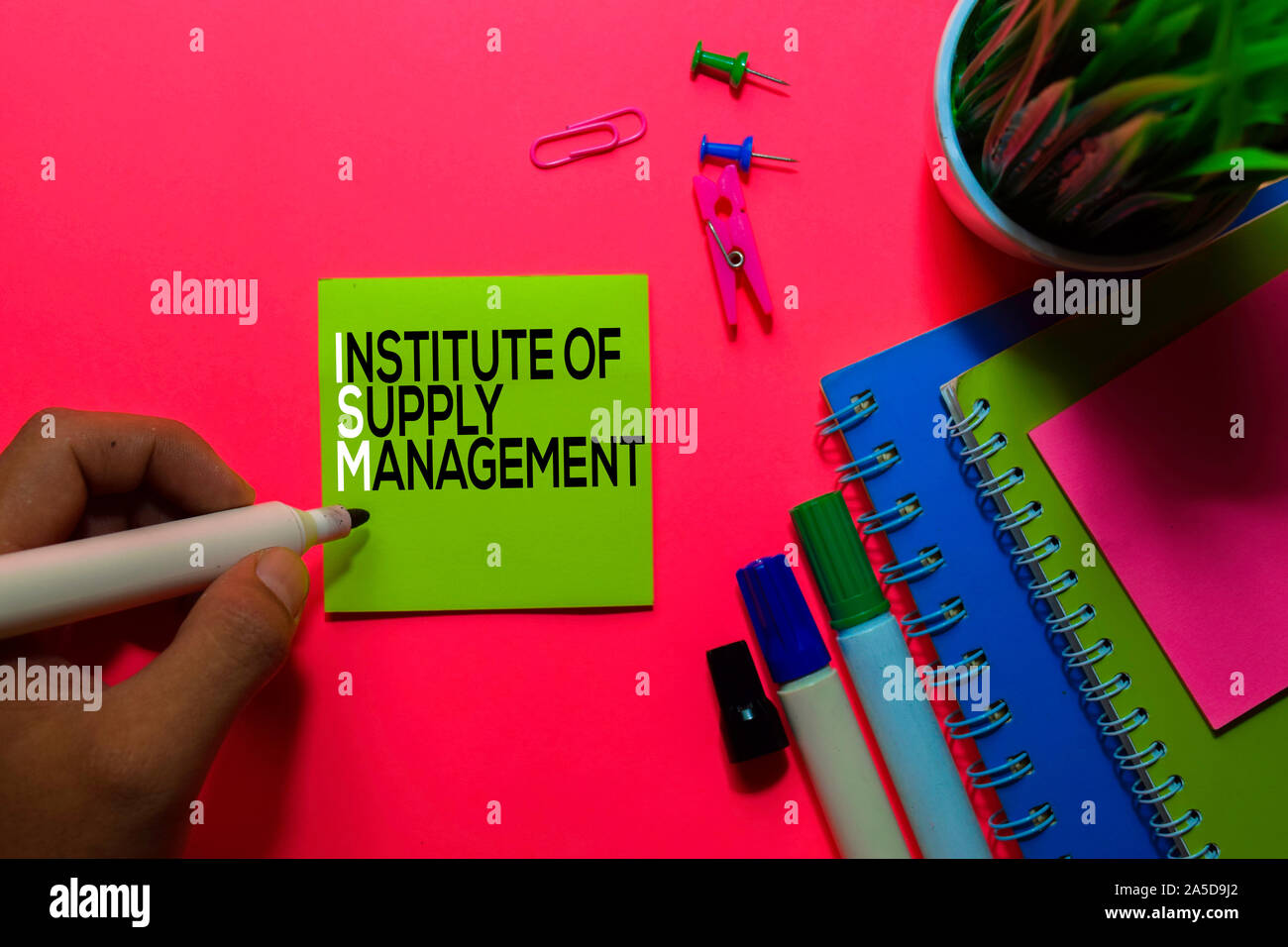 ISM. Institute of Supply Management acronym on sticky notes. Office ...