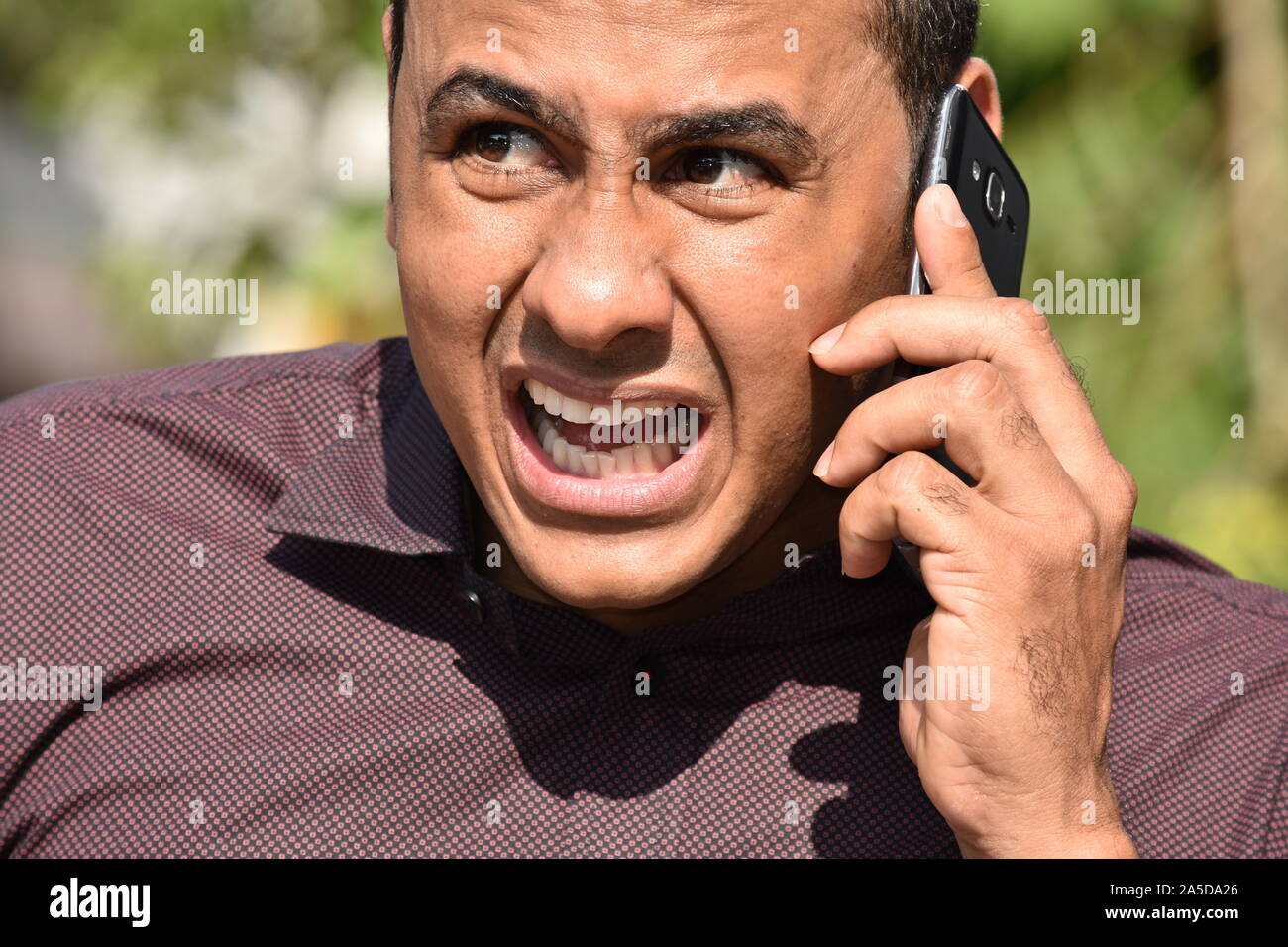 Person Using Cell Phone And Unhappy Stock Photo - Alamy
