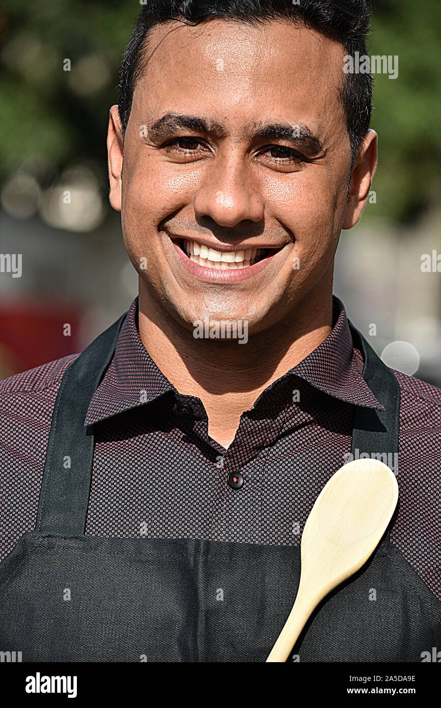 Happy adult male cook hi-res stock photography and images - Alamy