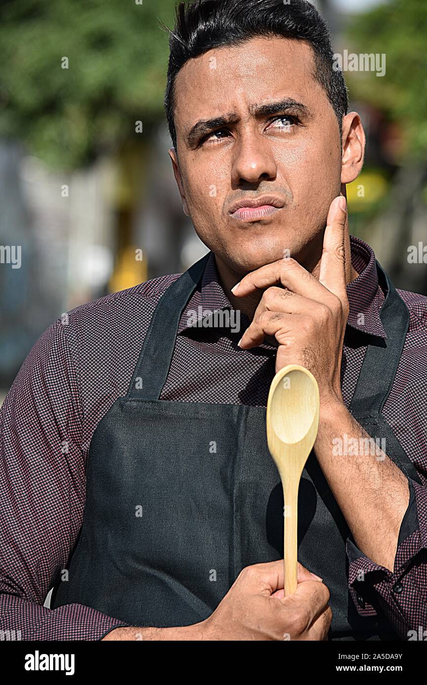 Adult Male Chef Or Cook Thinking Stock Photo - Alamy