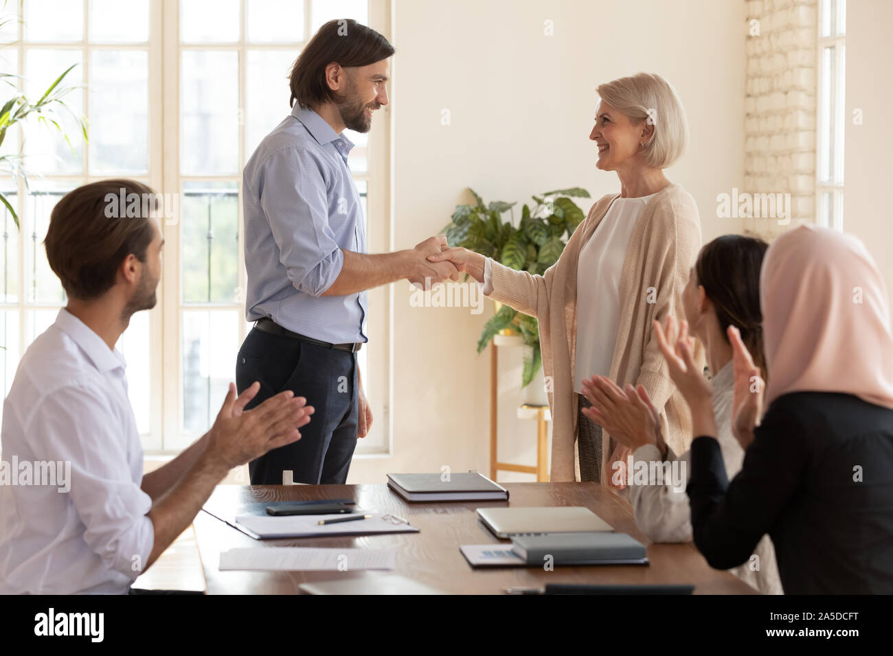 Promotion team hi-res stock photography and images - Alamy