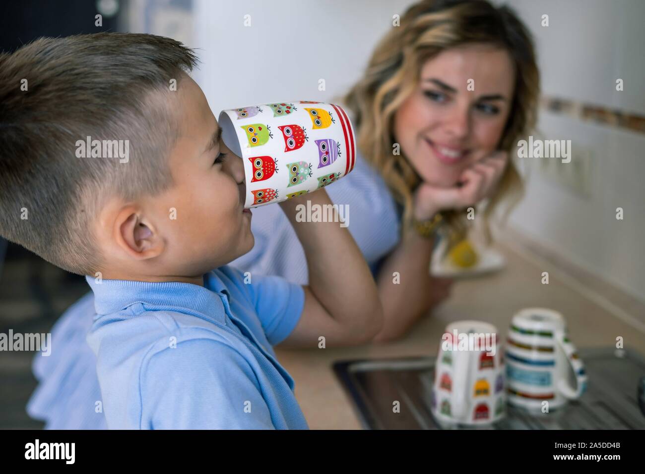Happy mum with son at home Stock Photo - Alamy