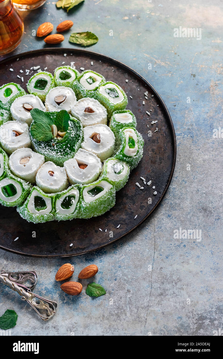 Turkish Delight. Assorted multi-colored oriental sweets with almonds on ...