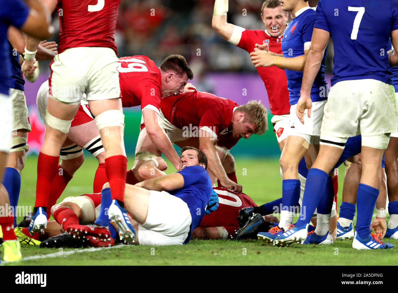 Wales' Ross Moriarty (bottom) scores his sides second try during the ...