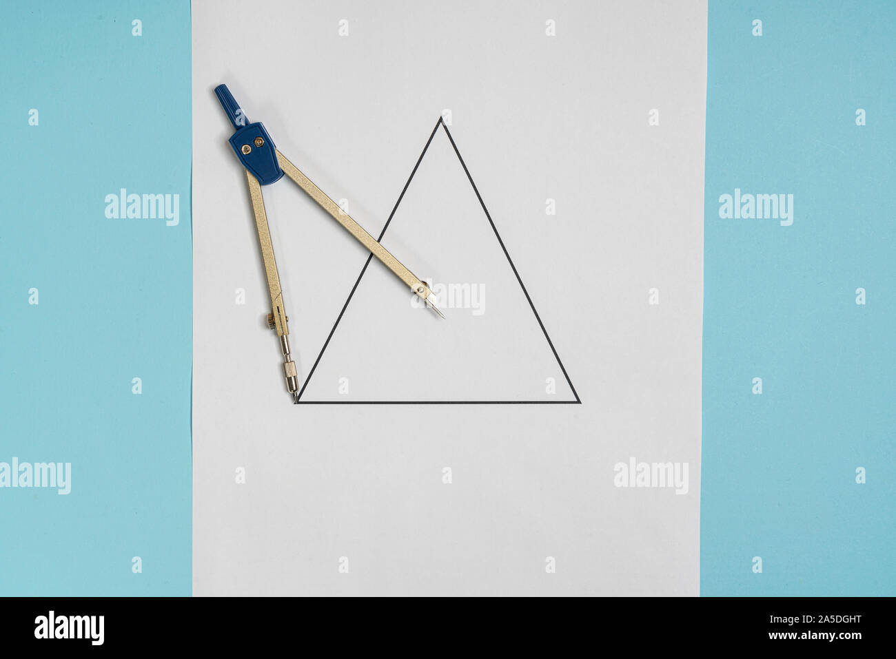 the triangle designed by a compass on a white sheet Stock Photo - Alamy