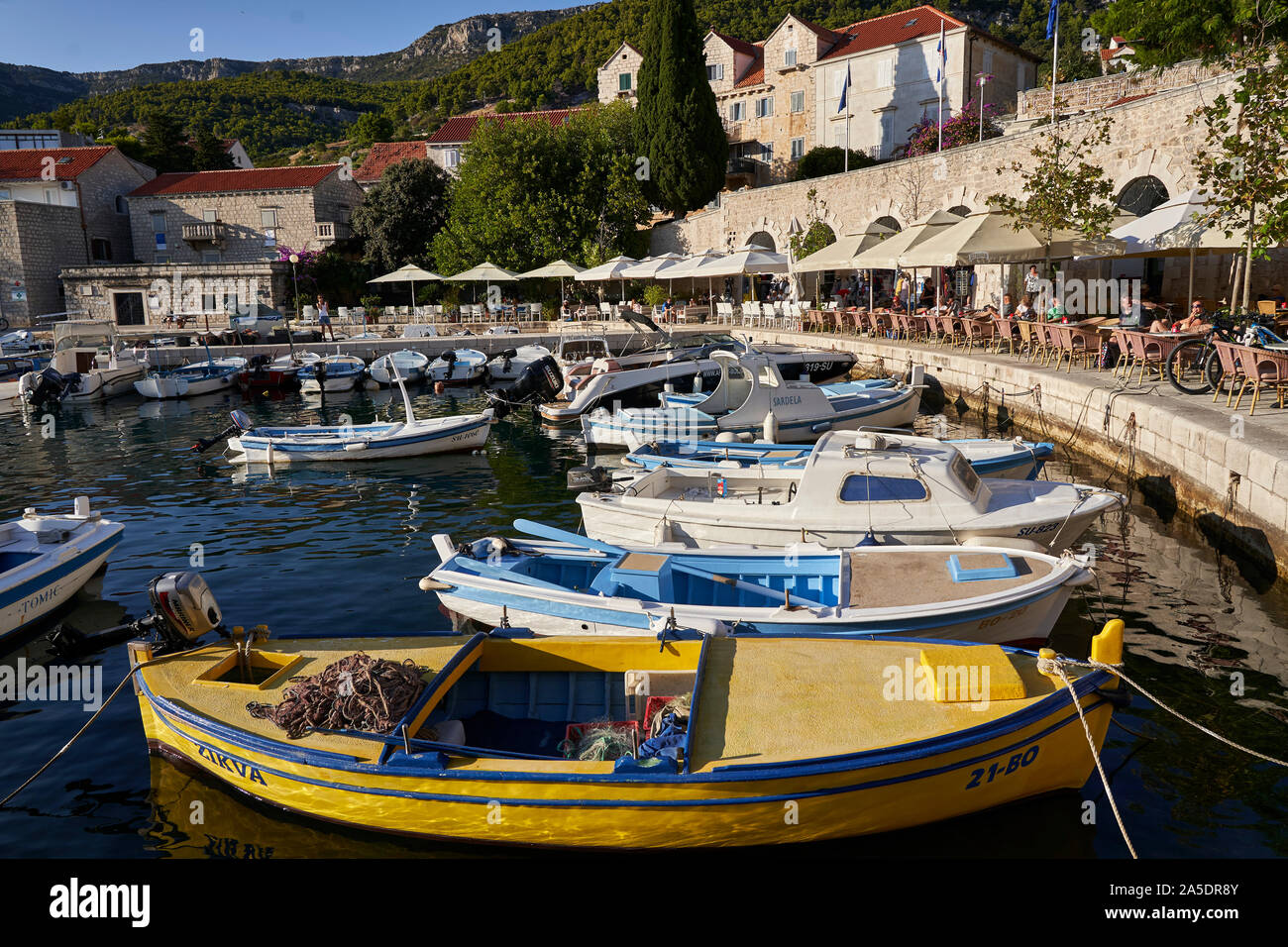 Bol marina with boats tied up in harbour, Brac, Croatia Stock Photo - Alamy