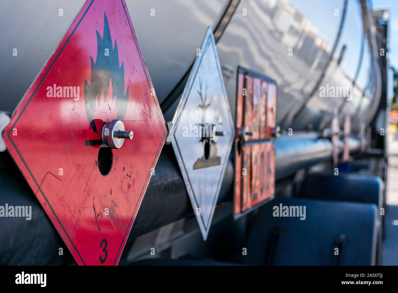 Labels and plates with danger number on a tank truck Stock Photo - Alamy
