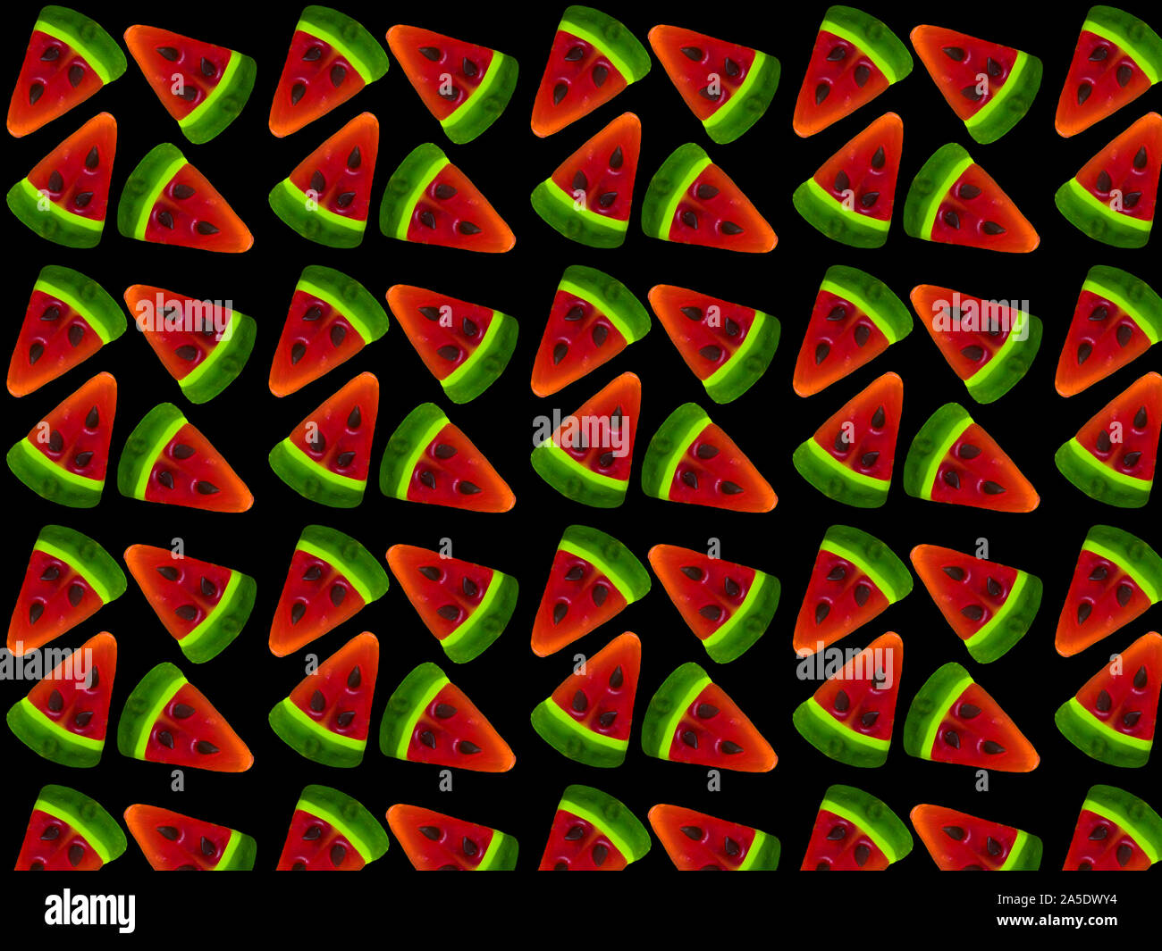 Seamless pattern from slices of watermelon on a black background. Print ...
