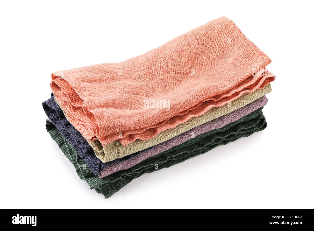 Textile napkins of various colors isolated on white background. Stacked ...