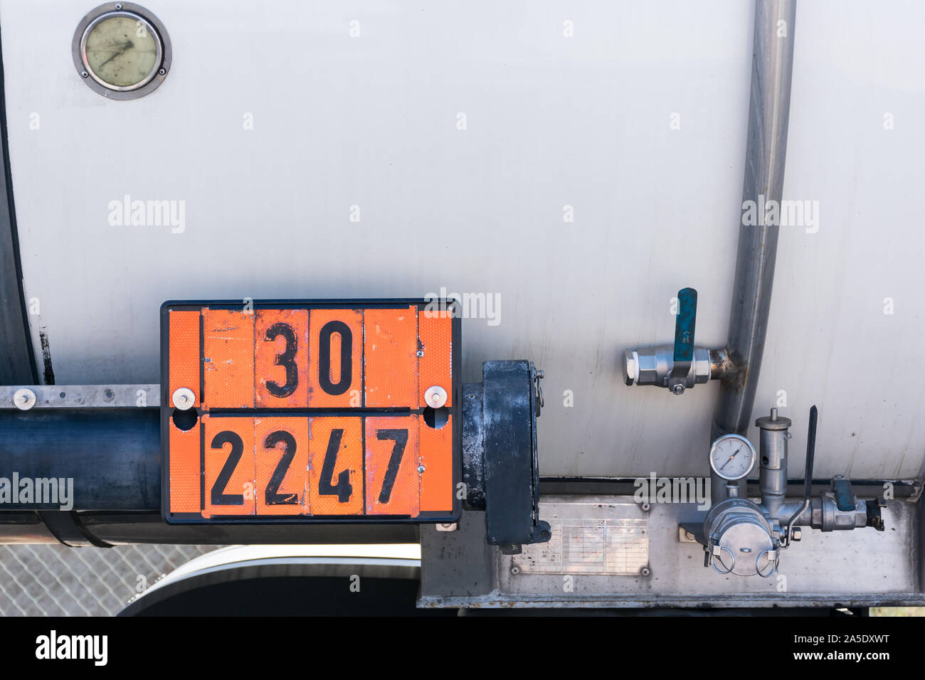 Labels and plates with danger number on a tank truck Stock Photo - Alamy