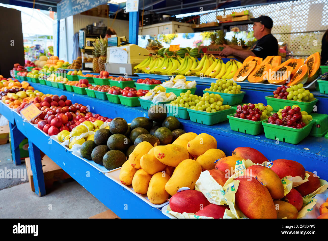 Montreal, Canada, June, 2018: Various fruits on the stall with a ...