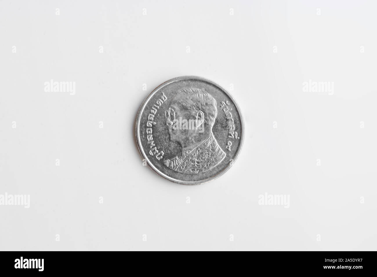 Coin - 1 Thai Baht on a white background. Thai currency Stock Photo - Alamy