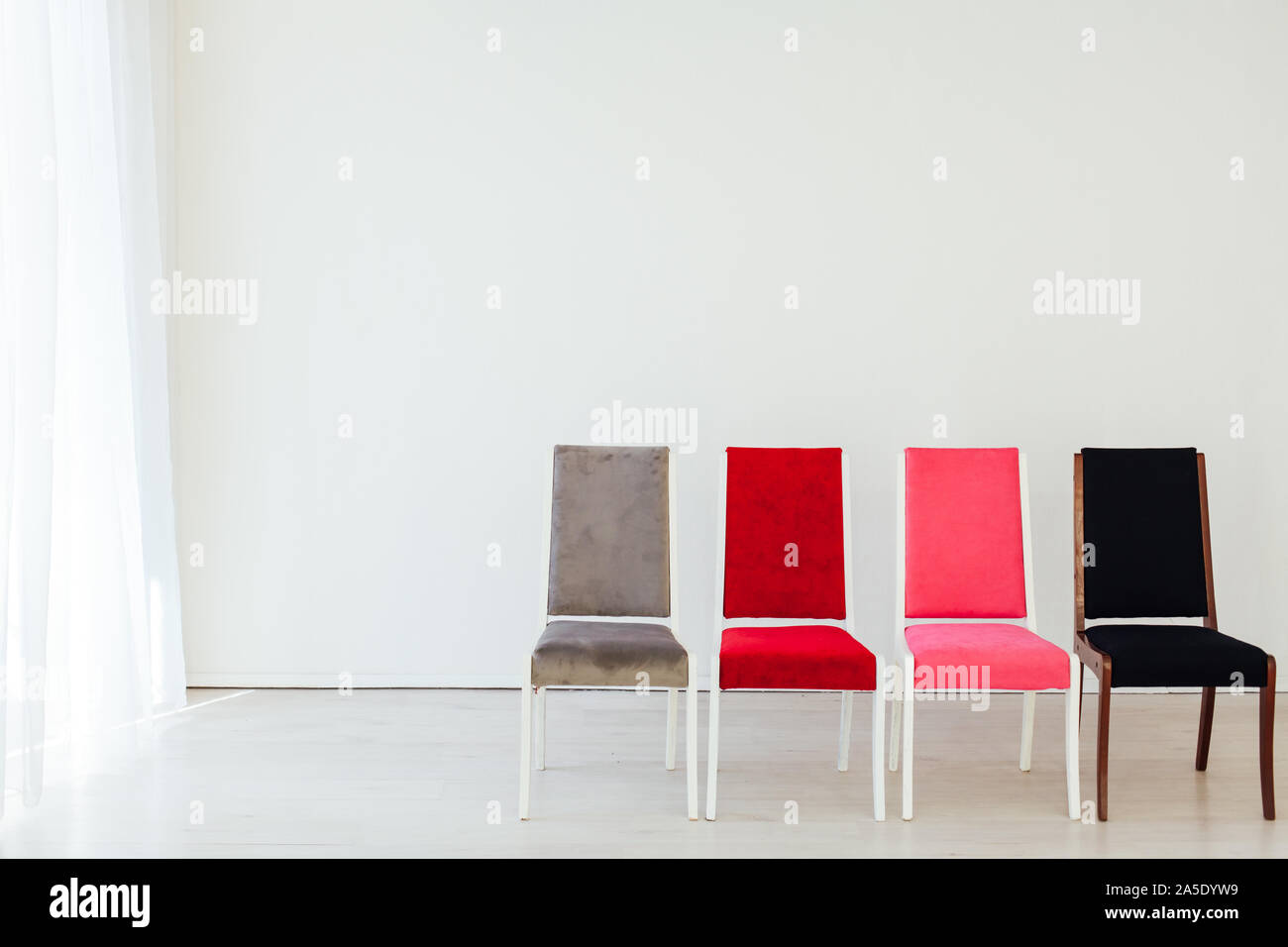 four chairs in the interior of an empty white room Stock Photo - Alamy
