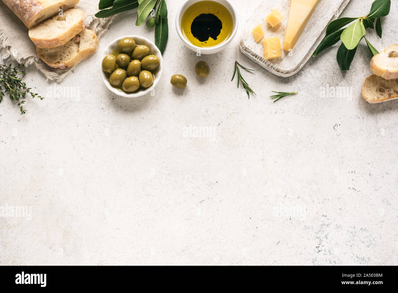 Mediterranean food background. Fresh italian ciabatta bread with herbs ...