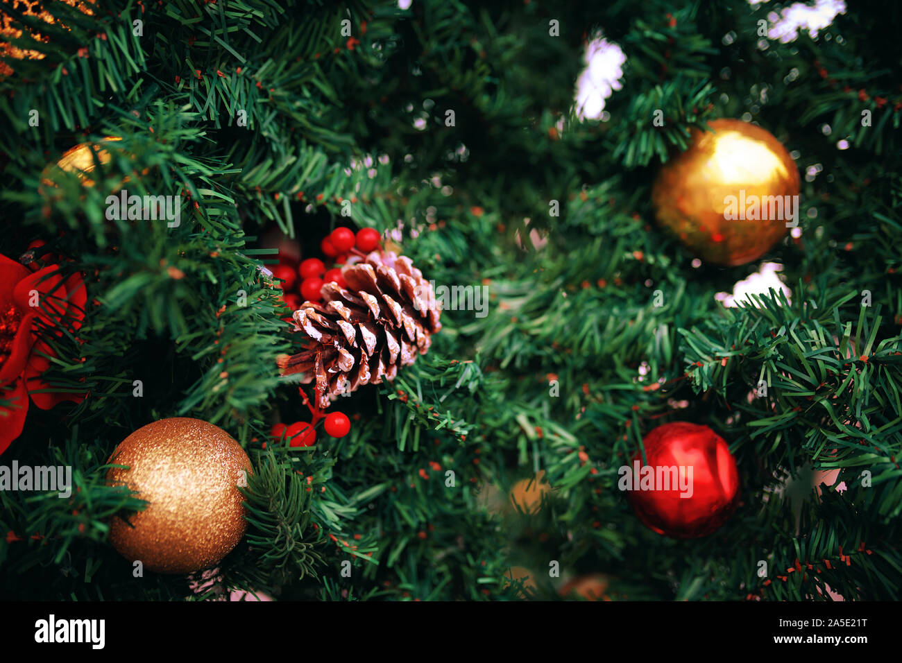 Decorating Christmas tree close up. Close up on Christmas tree and ...
