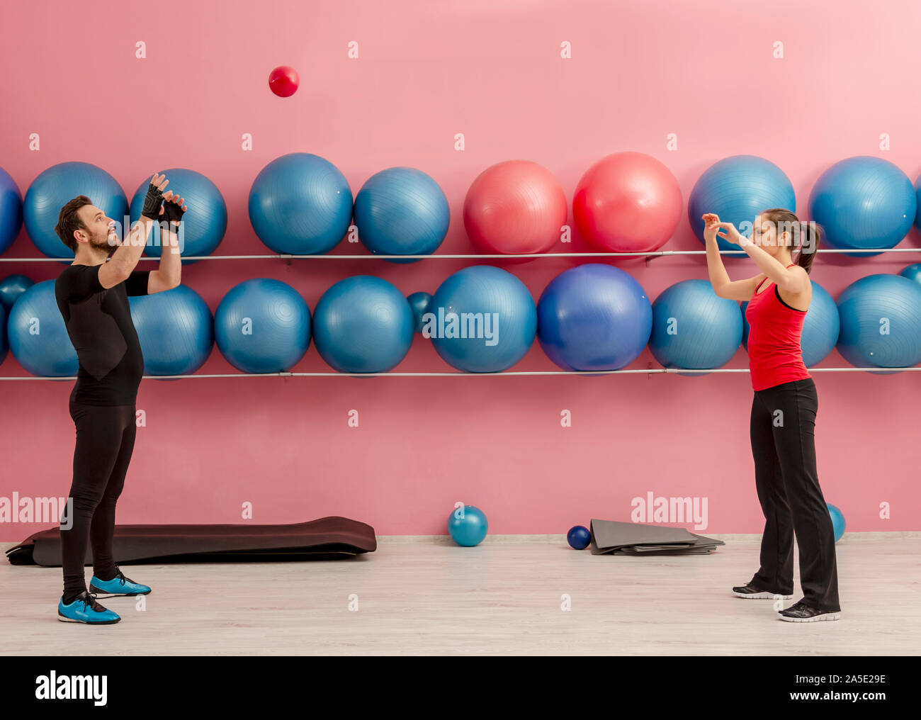 Happy young couple balls hi-res stock photography and images - Alamy
