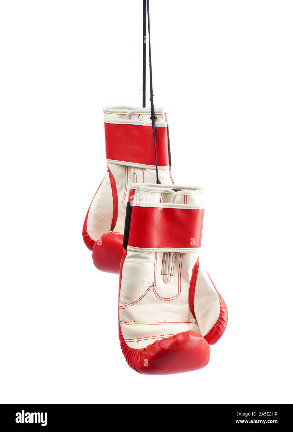 pair of red leather boxing gloves hanging on a black rope, object ...