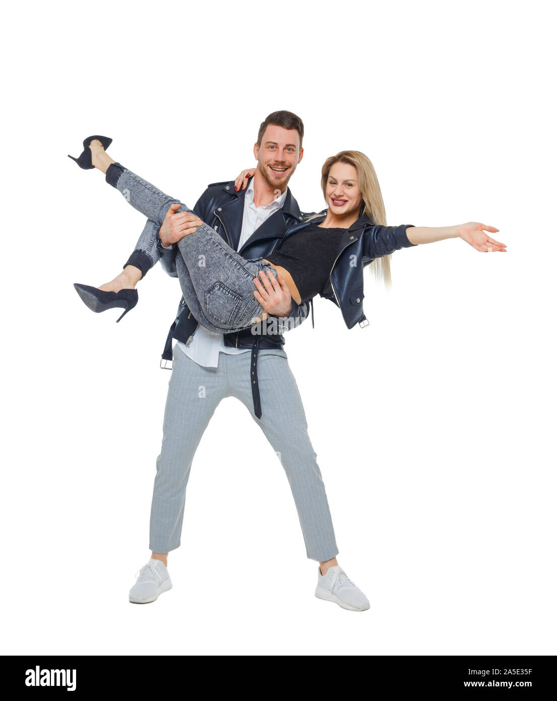 A Man Is Holding A Woman In His Arms Smiling Couple Front View The