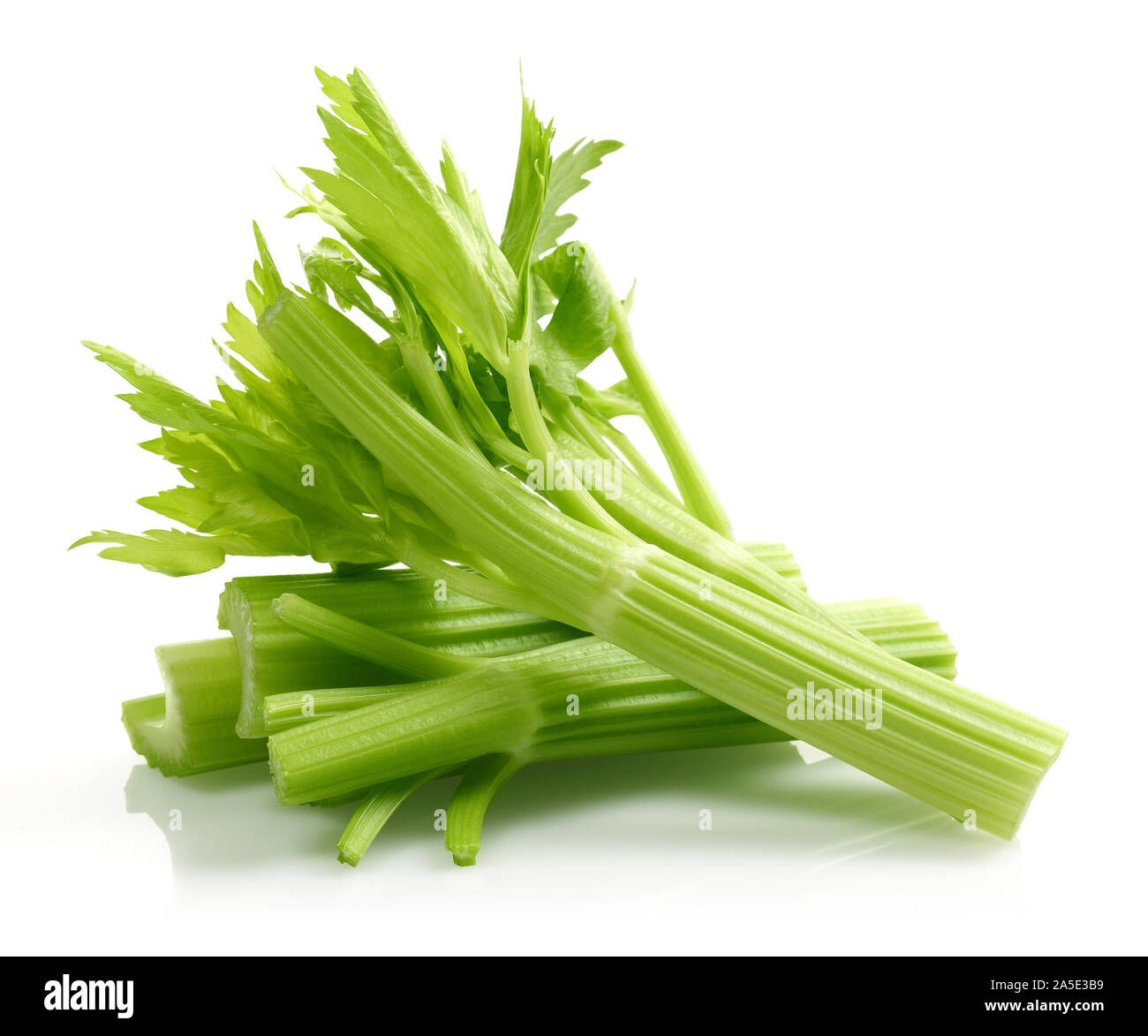 Fresh celery stalks and leaves isolated on white background Stock Photo ...
