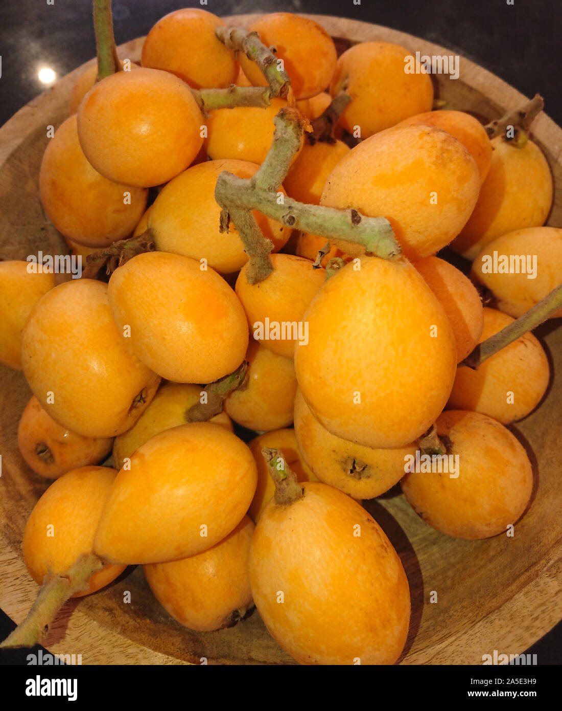 Loquat fruits (Eriobotrya japonica) . This ancient fruit rich in ...