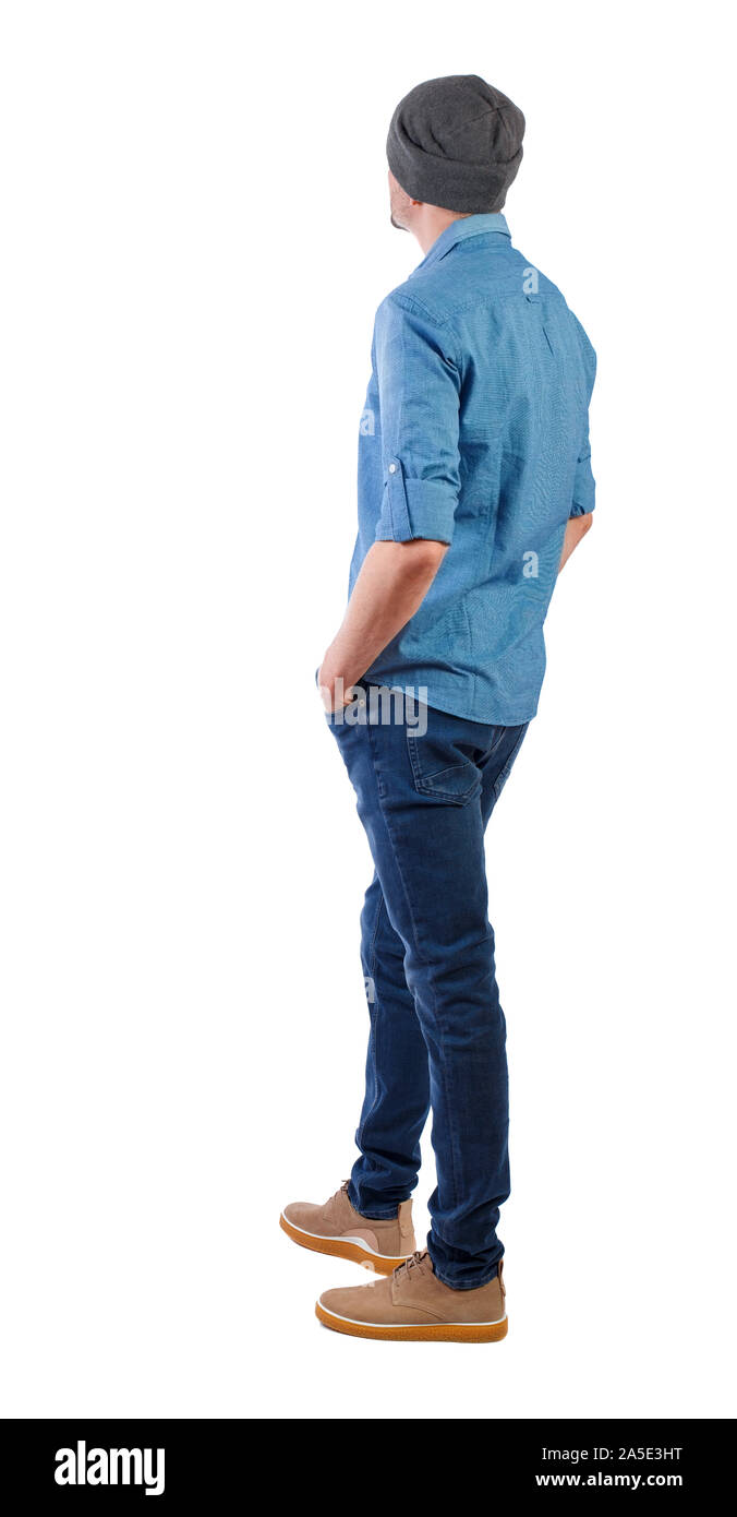 Back view of man in gray hat. Standing young guy. Rear view people ...